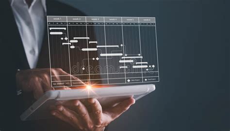 Project Manager Working With Gantt Chart Schedule To Plan Tasks And