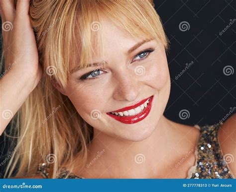 Intensely Beautiful Blonde Head And Shoulders Shot Of A Gorgeous Young Blonde Wearing Bold