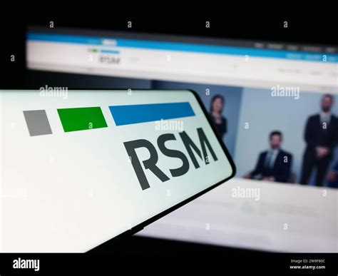 Smartphone With Logo Of Global Accounting Company Rsm International Ltd