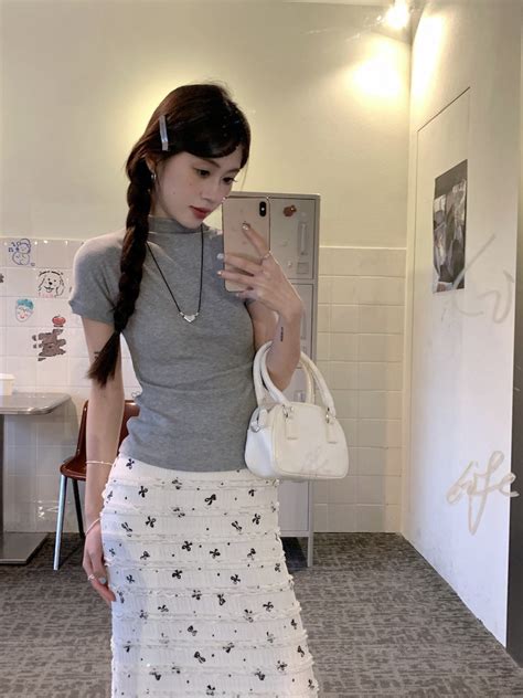 实拍韩系度假风蝴蝶结印花蕾丝碎花鱼尾半身裙女纯欲长裙子63268 阿里巴巴