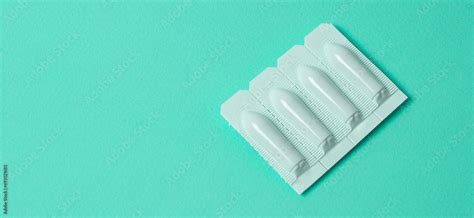 Vaginal Suppositories On Mint Background Top View Treatment Of