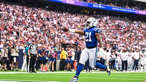 Download Zack Moss Celebrating Touchdown Wallpaper