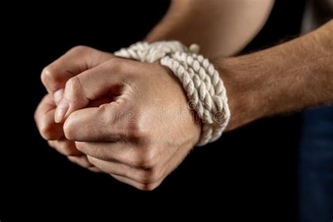 Man S Hands Tied With A Rope Close Up Stock Image Image Of Prisoner