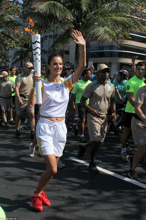 Adriana Lima Carries The Olympic Torch Ahead Of The Rio Olympics 2016