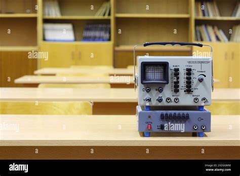 Old Educational Oscilloscope On Desk In Empty Physics School Class