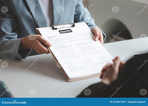 Person Submitting Resume To Interview For A Job With A Company Person