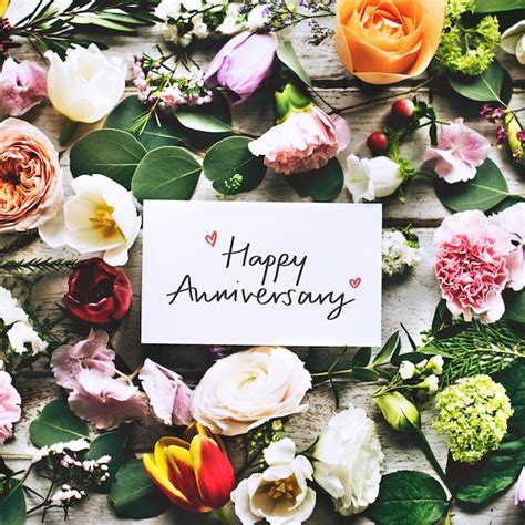 Happy Anniversary Card And Flowers Premium Photo