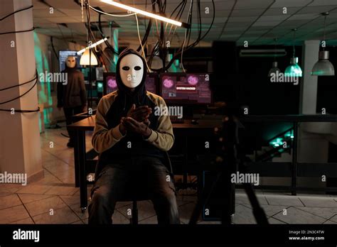 Ransomware And Internet Blackmail Concept At Night Anonymous Scammer