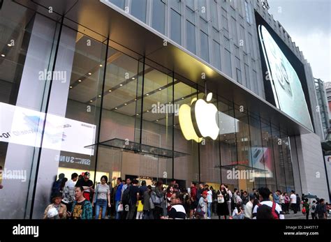 The Apple Retail Store Is Crowded With Fans Waiting To Experience The