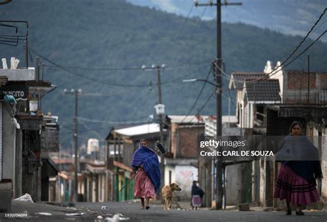 A Purepecha Indigenous Woman Walks Through Cocucho Indigenous Village