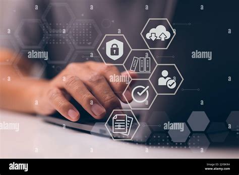 Businessman Employing A Computer To Document Management Online