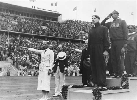 Jesse Owens Wins The 100 Meter Dash At Berlin Olympics In 1936 In Front Of Adolf Hitler And The