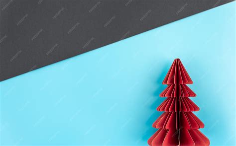 Free Photo Christmas Background With Origami Paper Tree On Paper