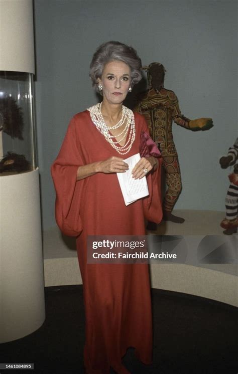 Babe Paley Wearing A Pink Silk Dress With A Pearl Necklace At The News Photo Getty Images