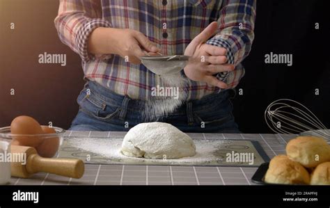 Artisan Bread Working With Dough Use A Sieve To Sift Flour Into Dough