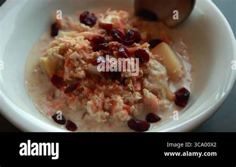 Cozy Healthy Breakfast Bowl Filled With Oatmeal Apple Slices Grated
