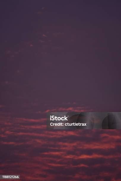 Vivid Orange Dawn Sunlight On Wavy Cloud Underside With Copy Space At