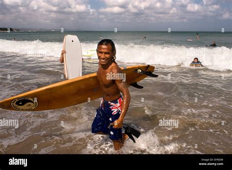 Surfers On The Beach Of Kuta Surfing Lessons Bali Kuta Is A Coastal