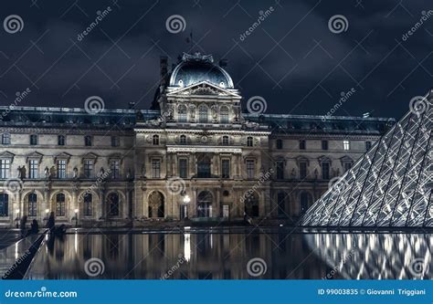 Night View Of The Louvre Museum With Crystal Pyramid Editorial Image