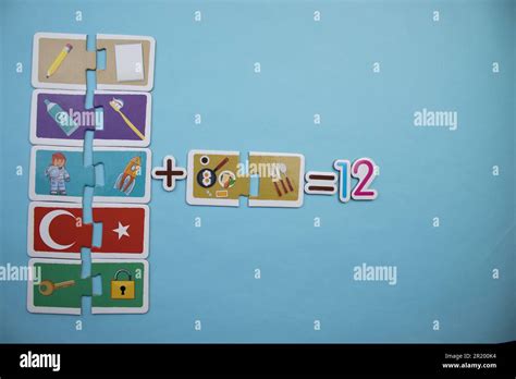 mathematical operation with educational puzzles placed on a blue