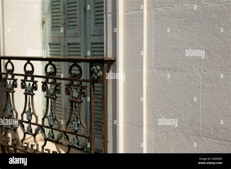 Close Up Of Classical Window With Green Shutters And An Ornate Railing Antibes France Stock