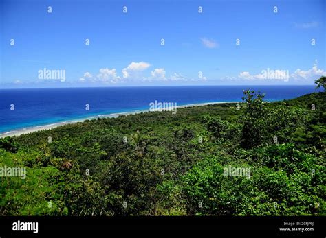 Lush Green Tropical Vegetation And Deep Blue Seas High Above Ritidian
