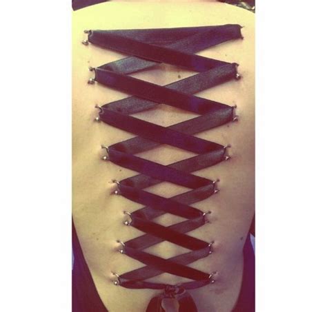 Pin Van Mark Jeffries Op Corset Piercing