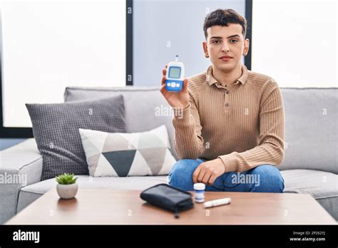 Non Binary Person Using Blood Pressure Monitor Thinking Attitude And Non Binary Person Using Blood Pressure Monitor Thinking Attitude And