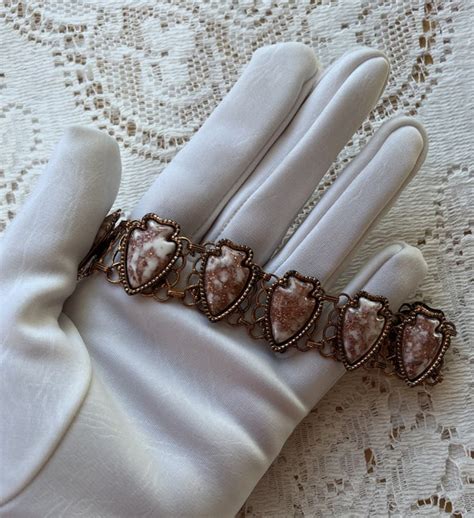 Vintage Arrowhead Arrow Head Shaped White With Copp Gem