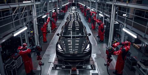 Human Labor And Robotics Collaborate Hightech Automotive Assembly Line For Efficient Car