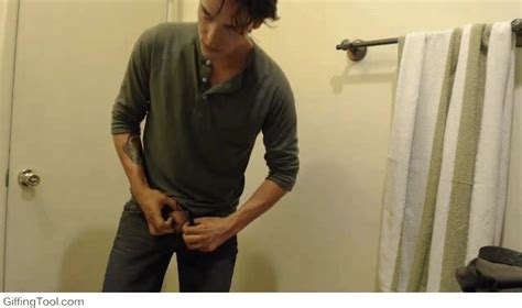 Slowly Unleashing An Enormous Uncut Cock From Trousers