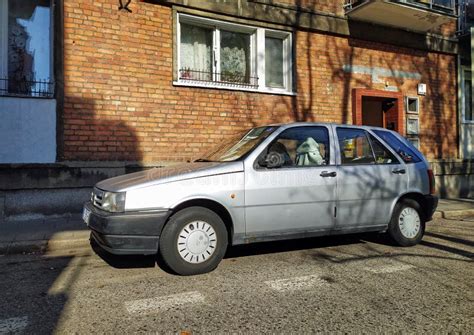 Old Little Silver Grey Italian Compact Hatchback Veteran Small Car Fiat Tipo 14 1988 Parked
