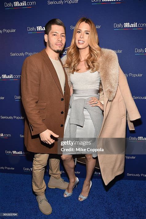 Adrian Torres And Carmen Carrera Attend Holiday Party