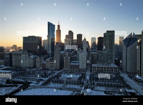 Aerial View Of Chicago At Night Showcasing The Illuminated Skyline Of