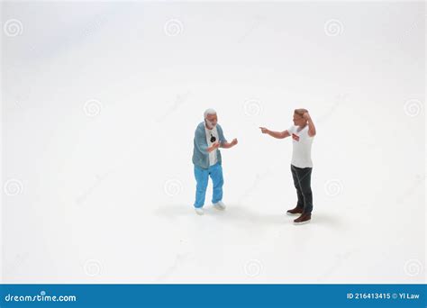 A Fun Of Tiny Man Fighting With The Man Stock Image Image Of Gesture Angry 216413415