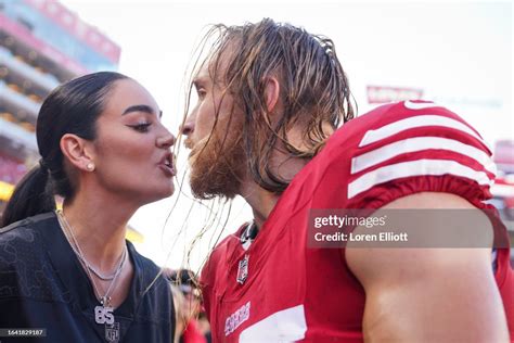 George Kittle Of The San Francisco 49ers Kisses His Wife Claire
