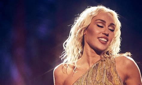 Miley Cyrus Flowers Tops Uk Singles Charts For Seventh Week