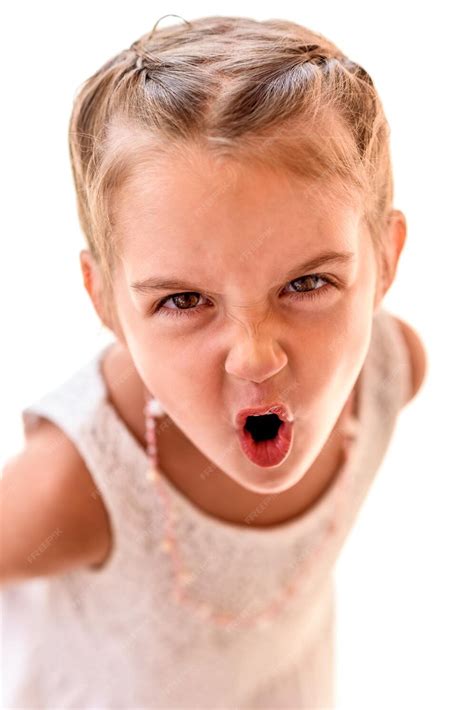 Premium Photo High Angle Portrait Of Angry Girl Making Face Against