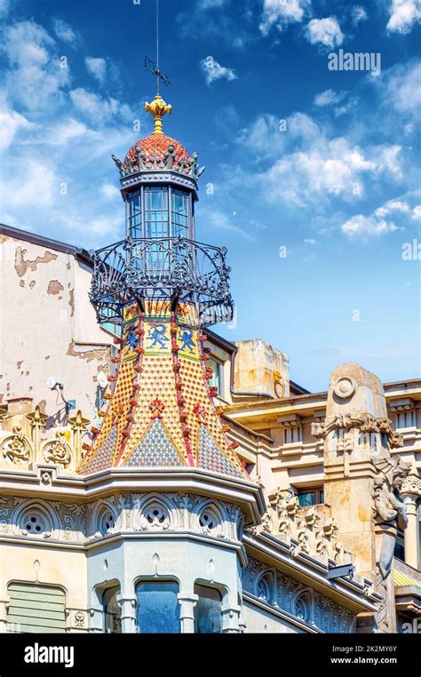 Architectural Detail Of A Small Tower With Multi Coloured Tiles On The