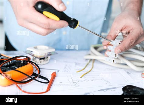 Man Repairer Making Electricity Project In House Repairs Planning