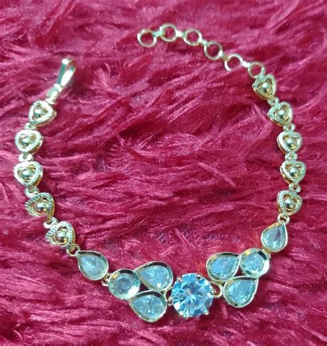 Alloy Sky Blue And Golden American Diamond Stone Bracelet At Rs 199
