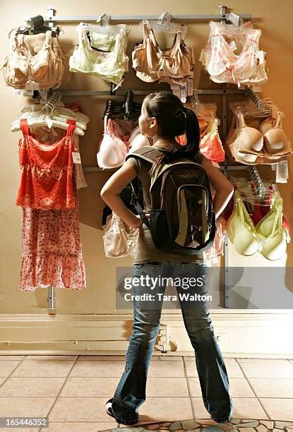 Bra Shopping 032707 Model Browses Through A Selection Of Bras