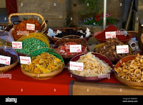 Sweet Dried Fruit And Produce For Sale At A Market Stall In The Bastide