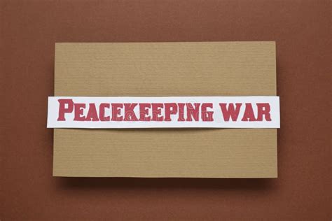 Paper Card With Phrase Peacekeeping War On Brown Background Top View Stock Image Image Of