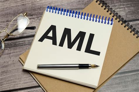 Premium Photo Aml Antimoney Laundering Words On Notepad And Wooden
