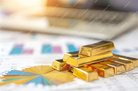 Premium Photo Gold Bars Stack On Loy Charts To Assess Marketing
