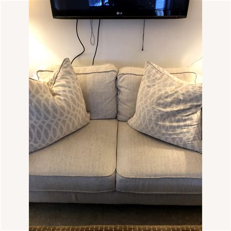 Living Spaces White Loveseat Sofa Aptdeco