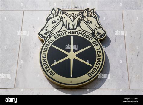 A Logo Sign Outside Of The Headquarters Of The International