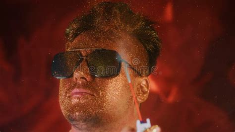 Calmness Relax Chill Face Man In Gold Glitter Comical Photo Funny Person Blowing Powder