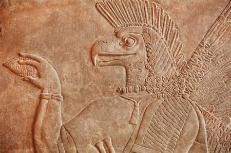 Historical Assyrian Relief Of Bird Face Genie Made In 850bc Editorial